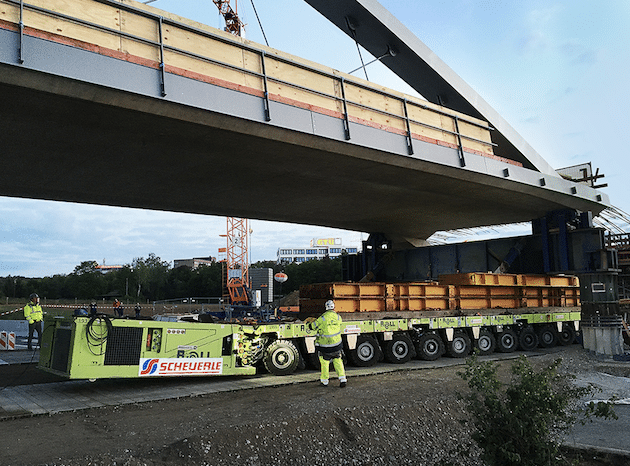 Schmidbauer moves 1,500-tonne bridge with SCHEUERLE SPMTs - Global Trailer
